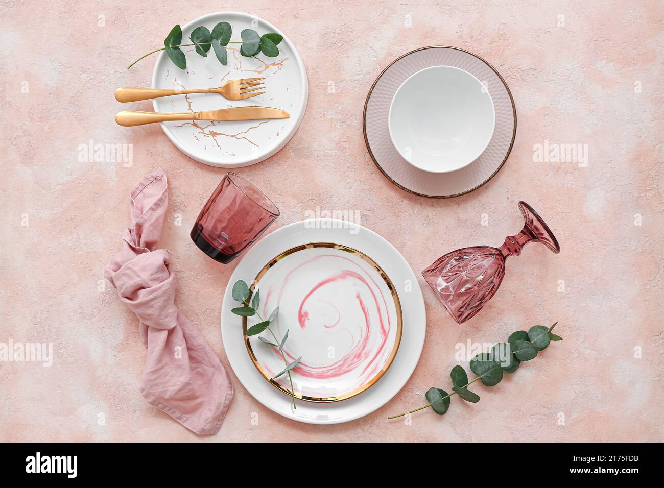 Stylish table setting on beige background Stock Photo - Alamy