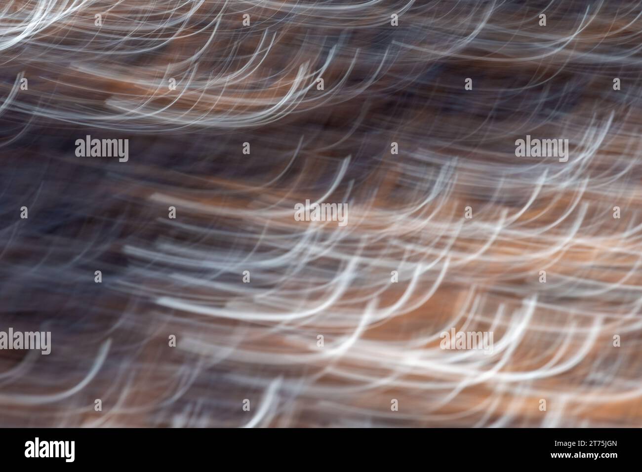 Abstract light painting with scalloped horizontal motion, intentional ...