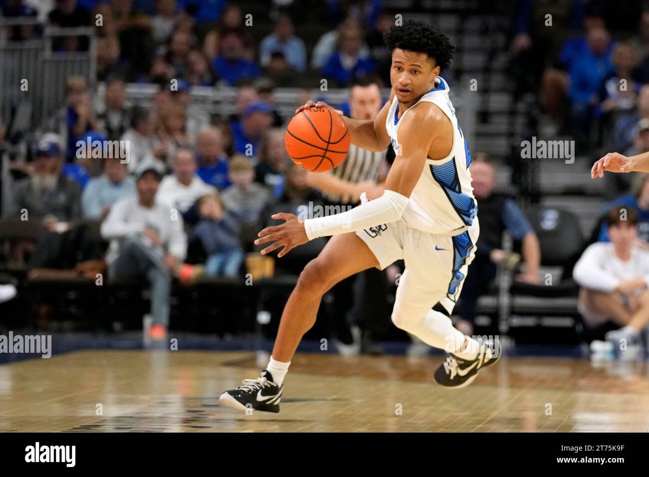 Creighton guard Trey Alexander drives up court during the first half of ...