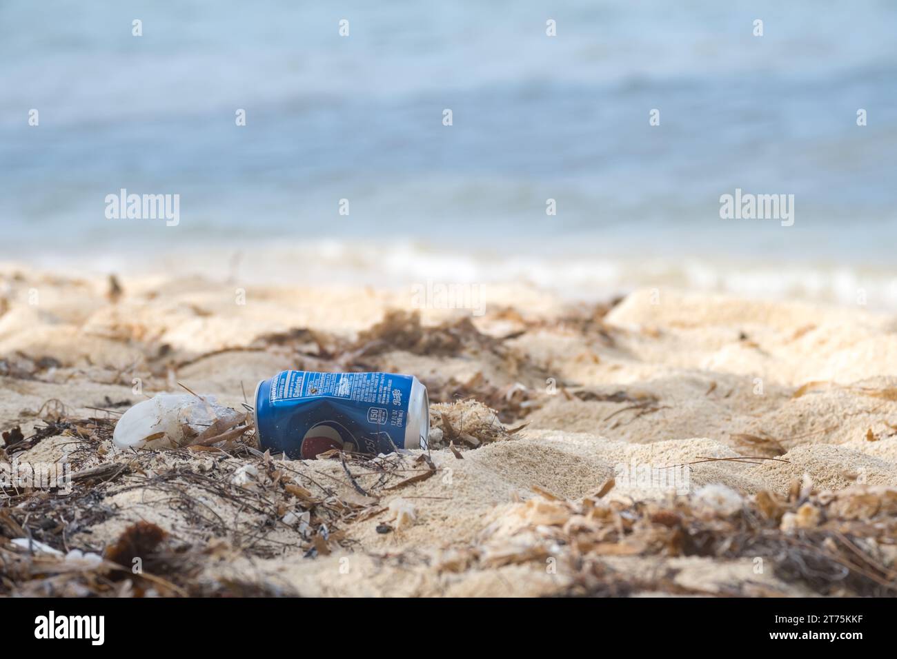 Washed up beach trash Stock Photo - Alamy
