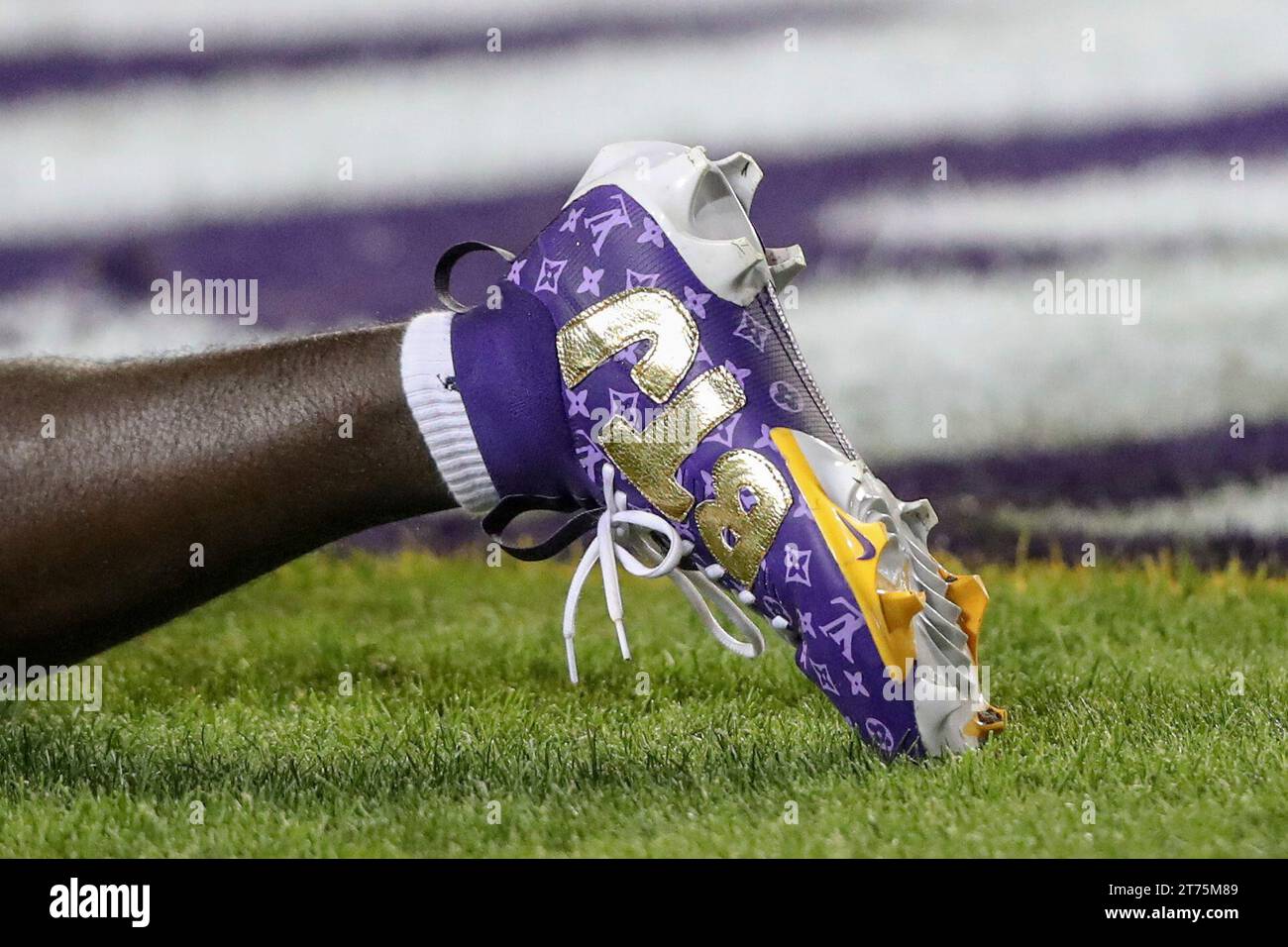 November 11, 2023: LSU's Brian Thomas Jr. (11) warms up in a pair of ...