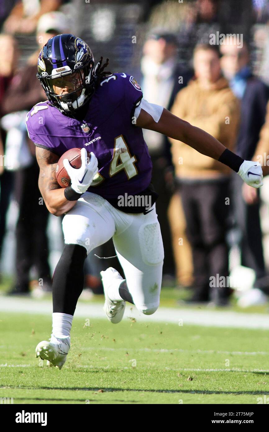 Baltimore Ravens running back Keaton Mitchell (34) runs during an NFL ...