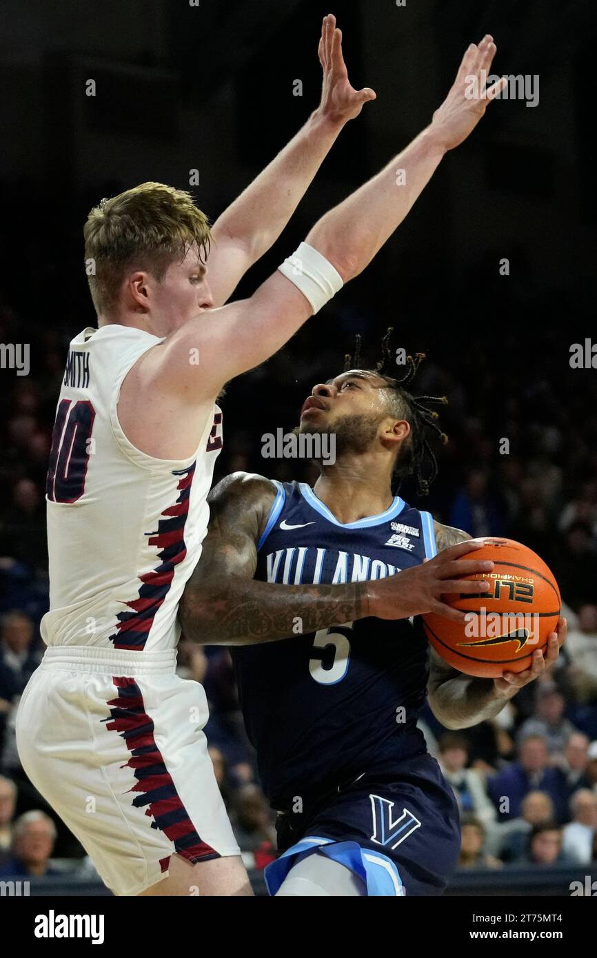 Villanova's Justin Moore, right, tires to get past Pennsylvania's ...