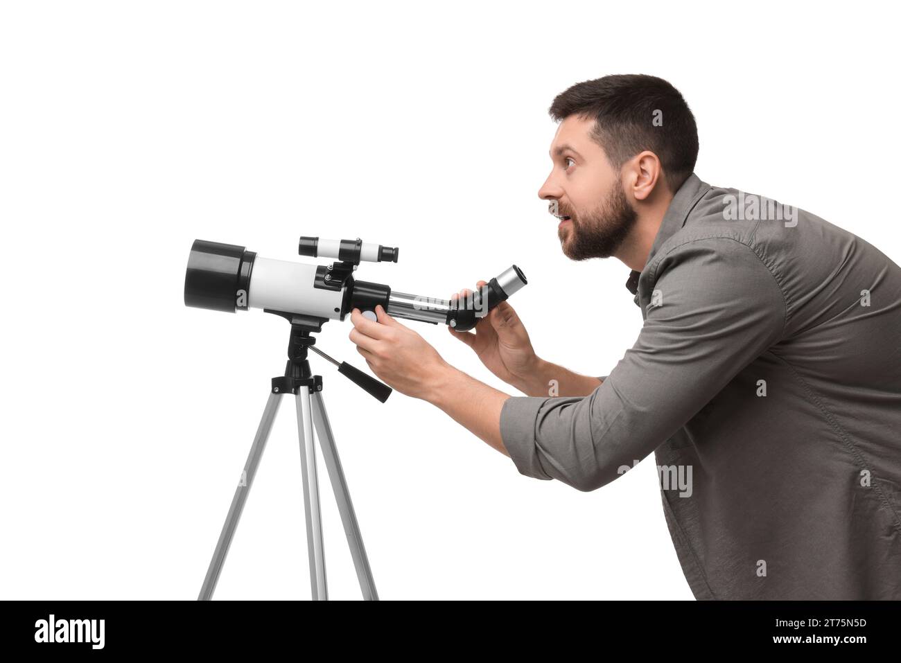 Focused astronomer with telescope on white background Stock Photo - Alamy