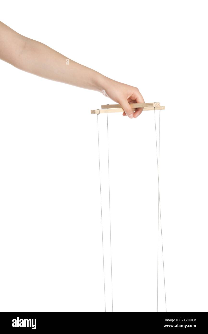 Woman pulling strings of puppet on white background, closeup Stock ...