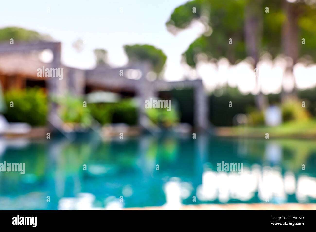 Blurred view of outdoor swimming pool at luxury resort Stock Photo - Alamy