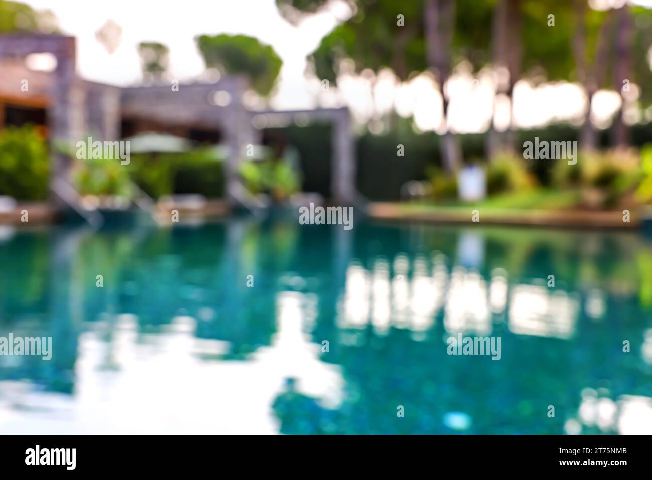 Blurred view of outdoor swimming pool at luxury resort Stock Photo - Alamy