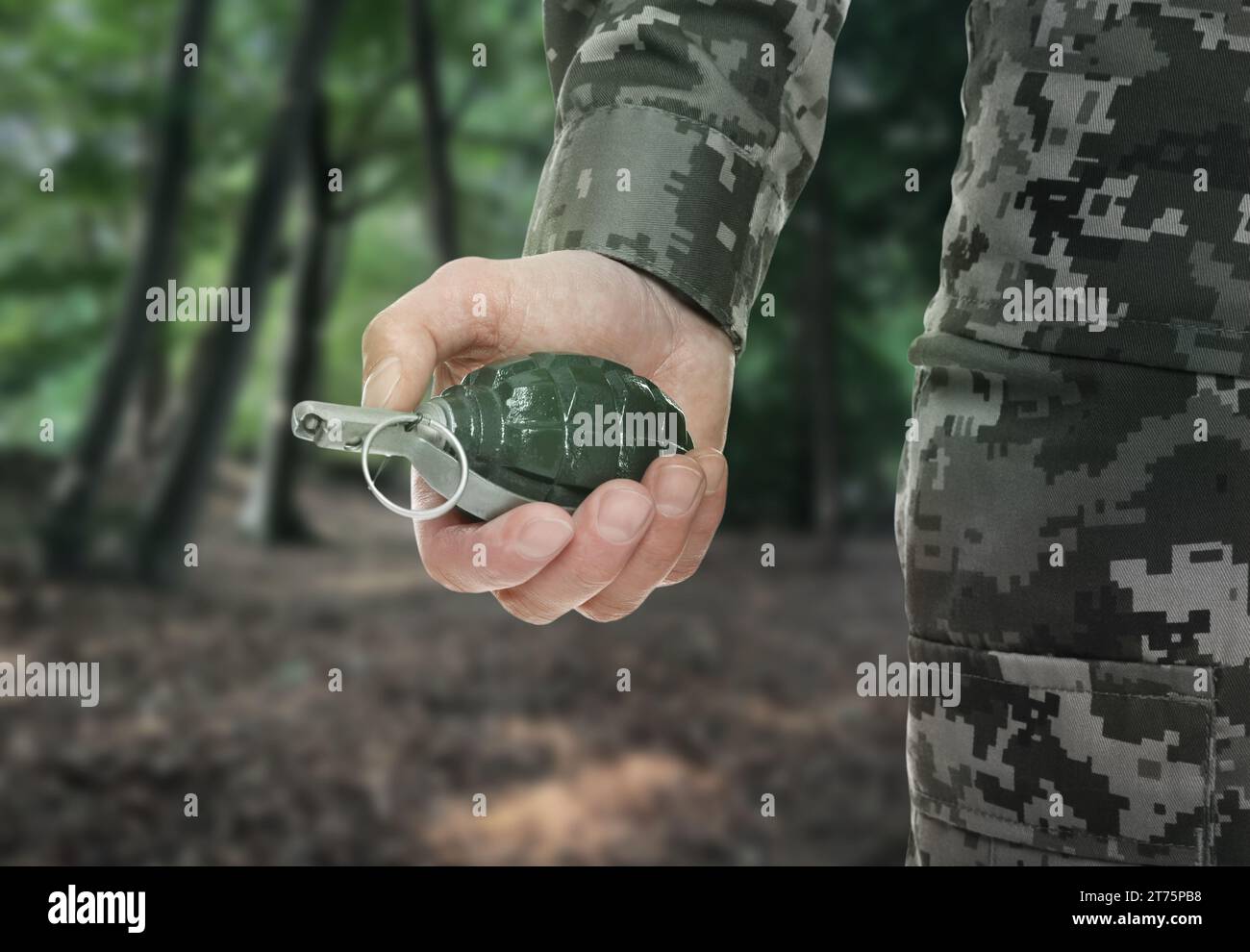Holding equipment soldier in camouflage hi-res stock photography and ...