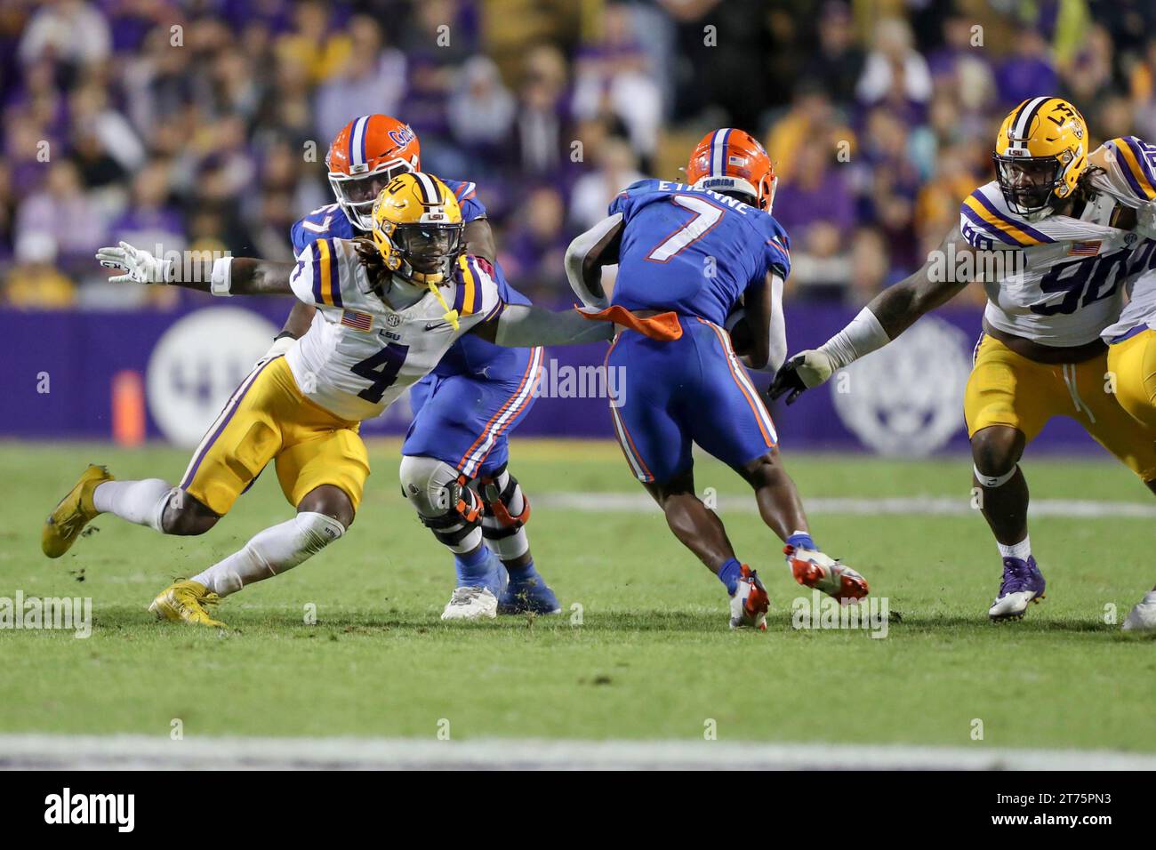 November 11, 2023: LSU's Harold Perkins Jr. (4) and Jacobian Guillory ...
