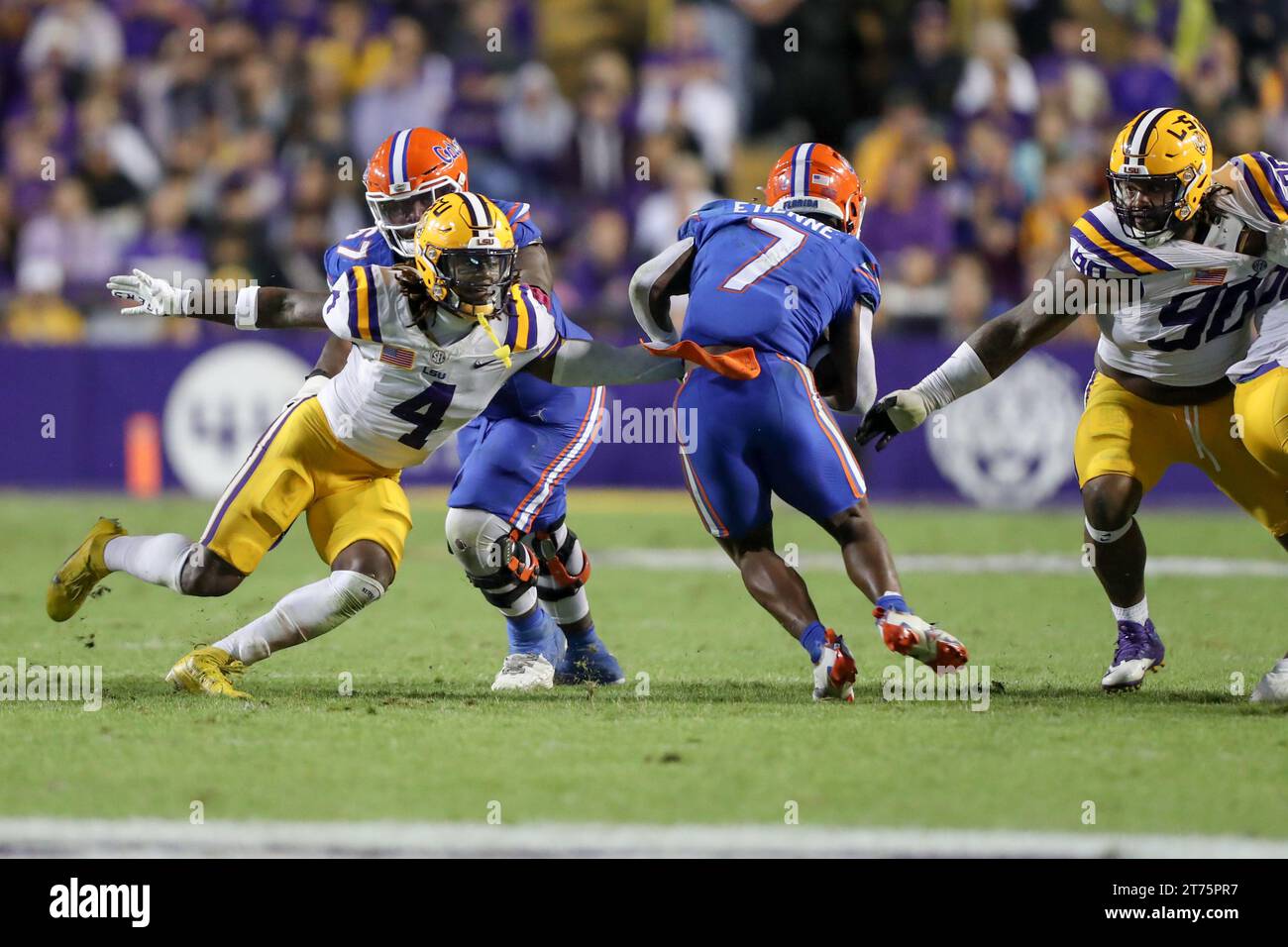 November 11, 2023: LSU's Harold Perkins Jr. (4) and Jacobian Guillory ...