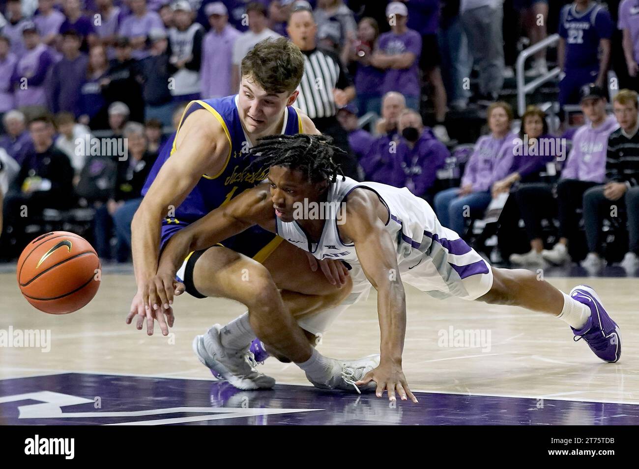 Kansas State guard Darrin Ames, right, and South Dakota State guard ...