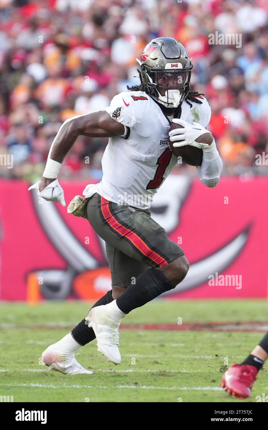 Tampa Bay Buccaneers running back Rachaad White (1) rushes with the ...