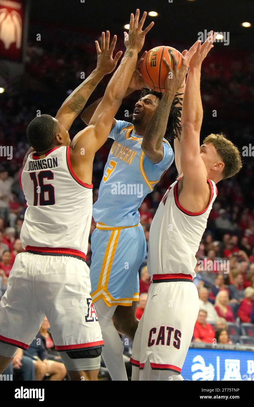 Southern University guard Tai'Reon Joseph (3) shoots between Arizona forward Keshad Johnson (16 ...