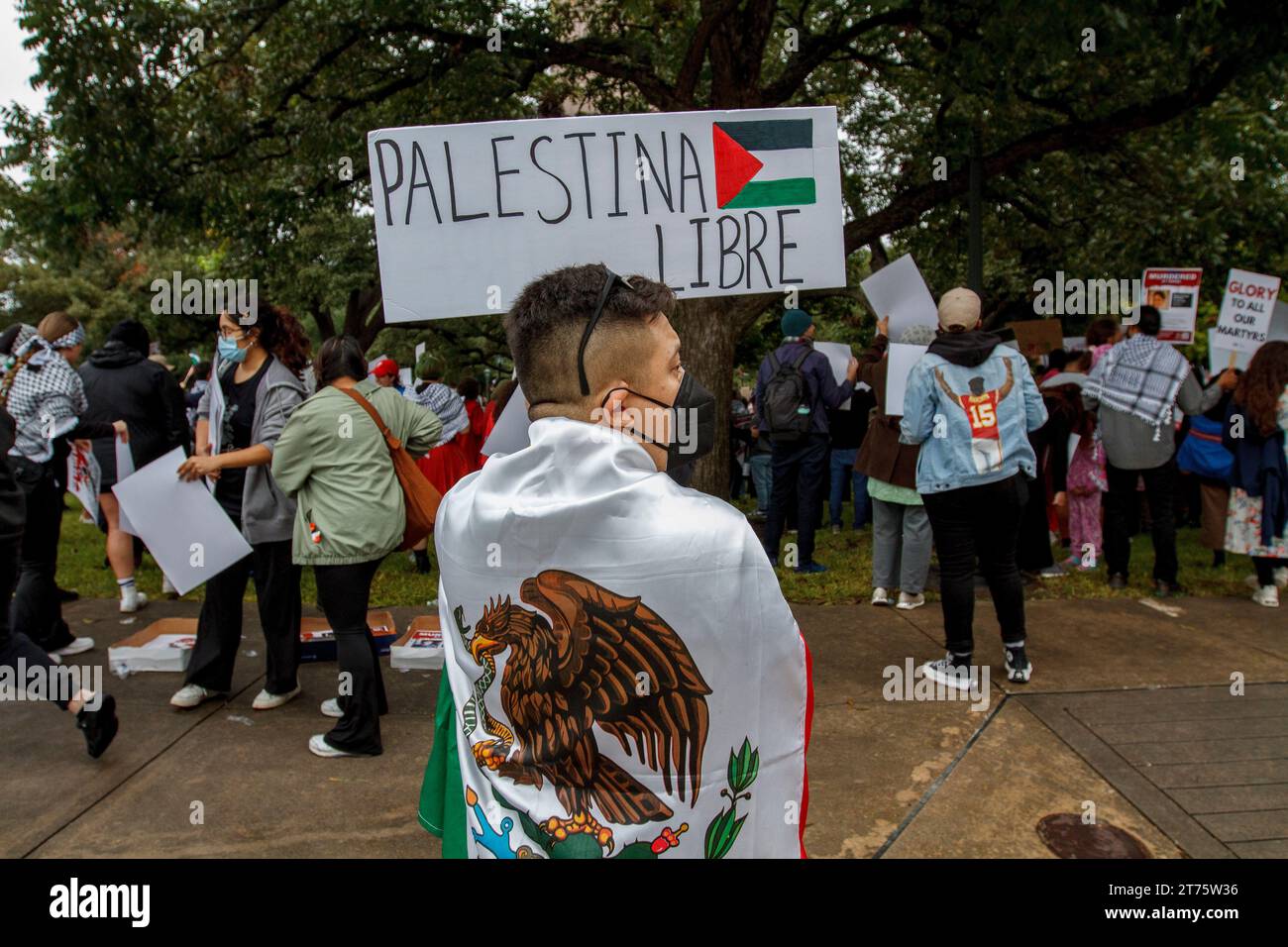 Austin, Texas, USA. 12th Nov, 2023. A Mexican-American man holds a sign ...