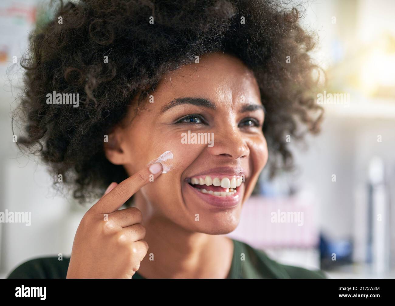 Face, woman and laugh with lotion for skincare for pigmentation ...