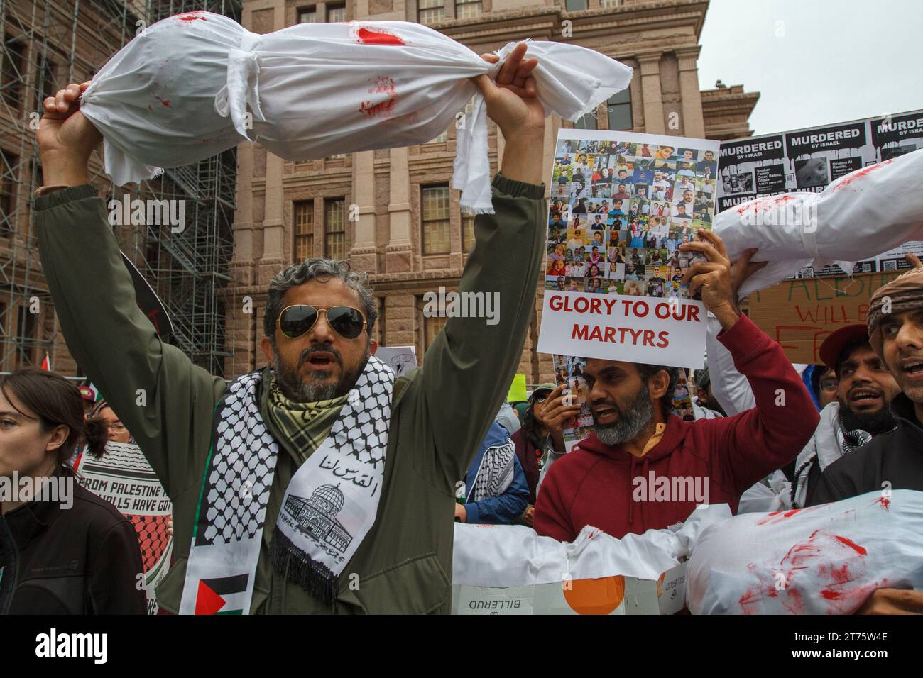 Austin, Texas, USA. 12th Nov, 2023. A man holds an effigy of dead child ...