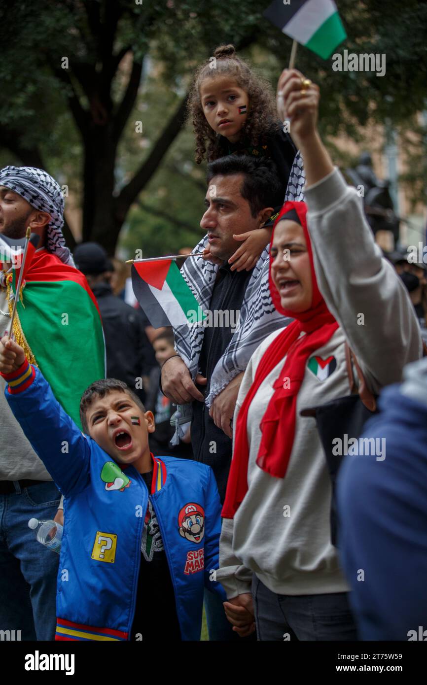 Austin, Texas, USA. 13th Nov, 2023. A family chants in support of the ...