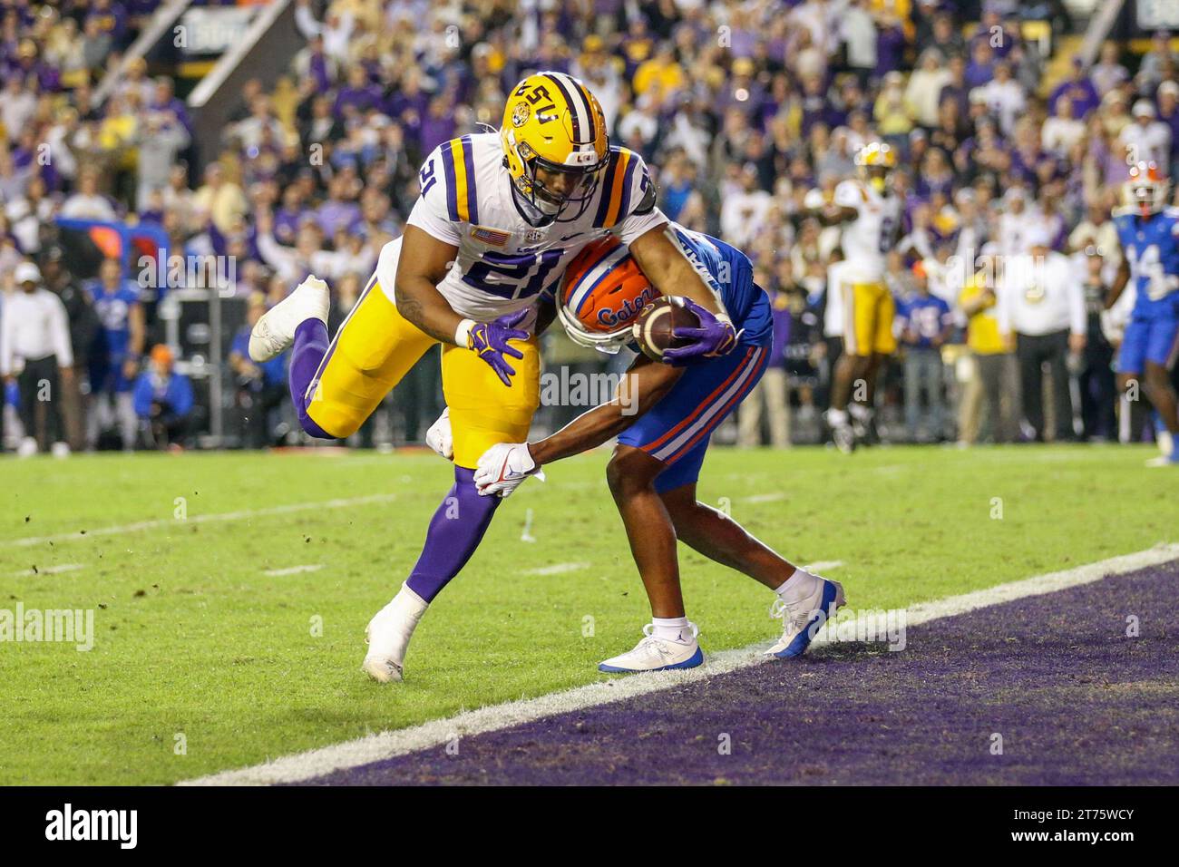 November 11, 2023: LSU running back Noah Cain (21) reaches the ball ...