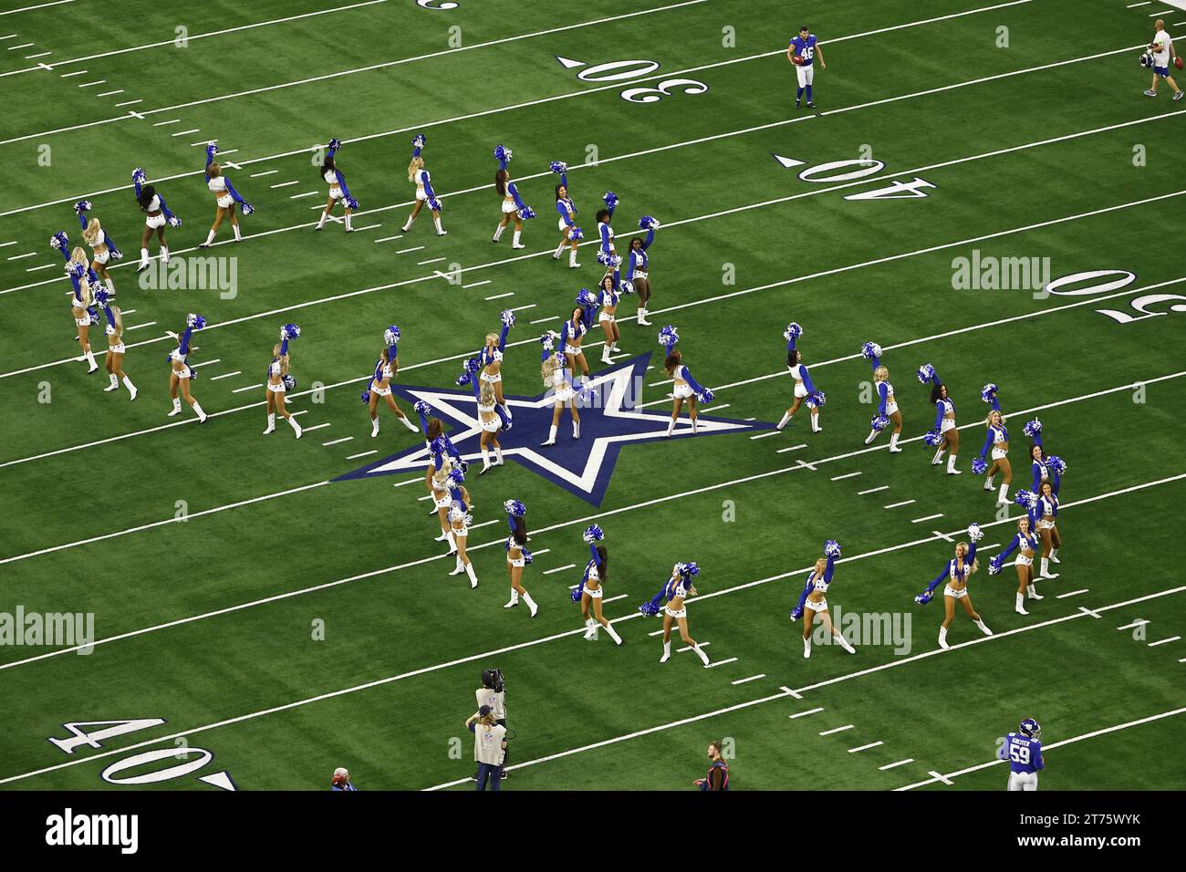 The Dallas Cowboys Cheerleaders perform before the start of an NFL ...