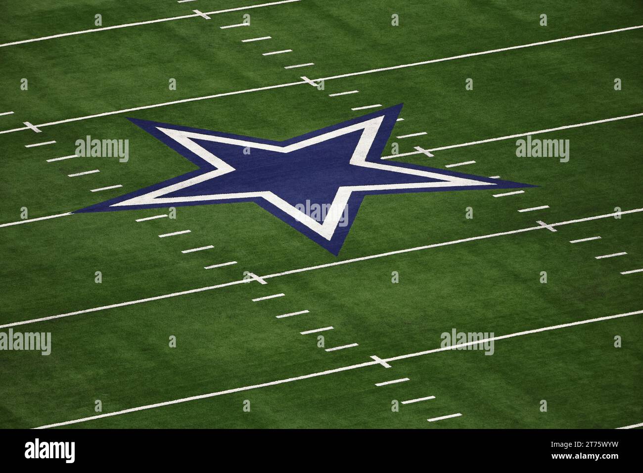 The Dallas Cowboys star is shown at midfield before the start of an NFL ...