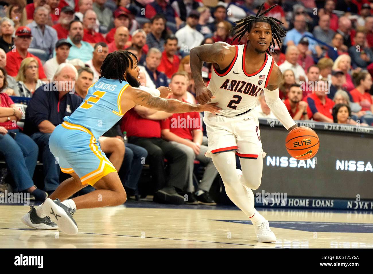 Arizona guard Caleb Love (2) drives past Southern University guard ...