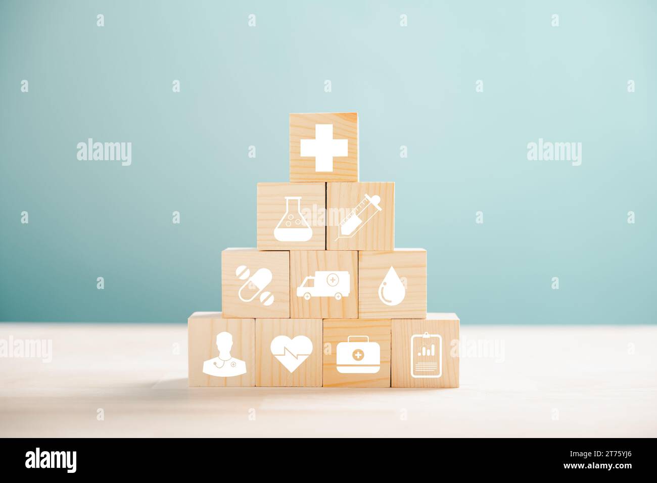 Medical symbols on wooden blocks stacked Stock Photo - Alamy