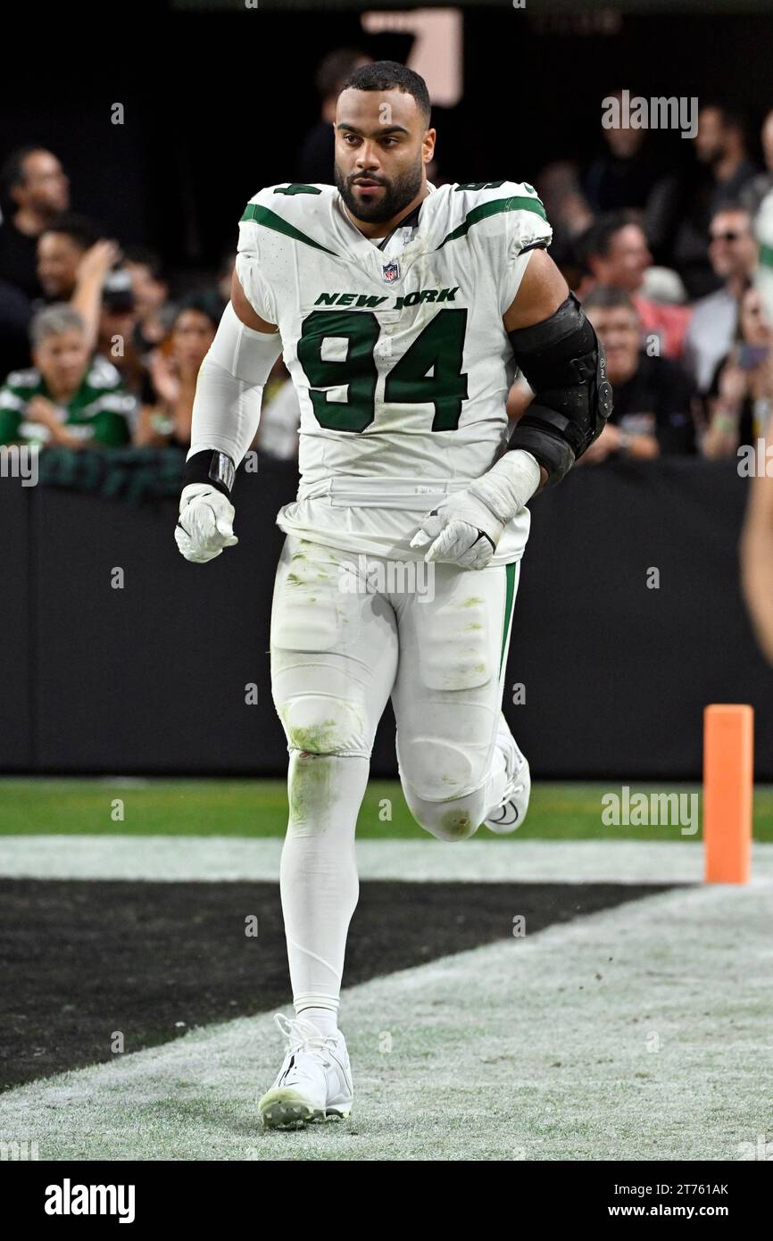 New York Jets defensive end Solomon Thomas (94) returns to the field ...
