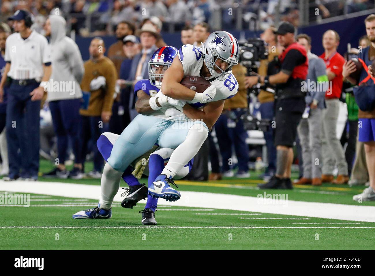 Dallas Cowboys tight end Jake Ferguson (87) is tackled by New York ...