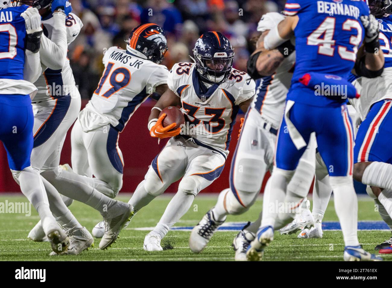 Denver Broncos running back Javonte Williams (33) rushes during an NFL ...