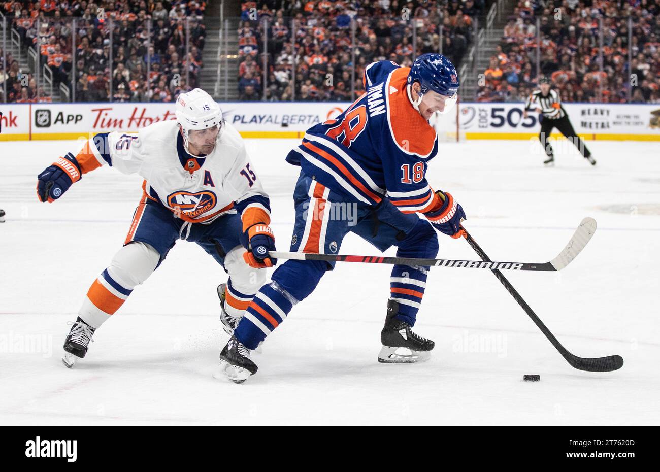 New York Islanders' Cal Clutterbuck (15) and Edmonton Oilers' Zach ...