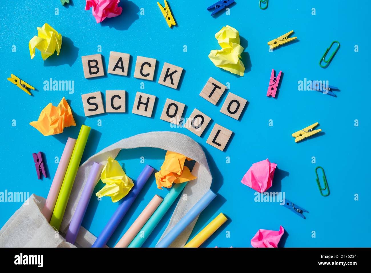 BACK TO SCHOOL message inscription text on wooden blocks on creative ...