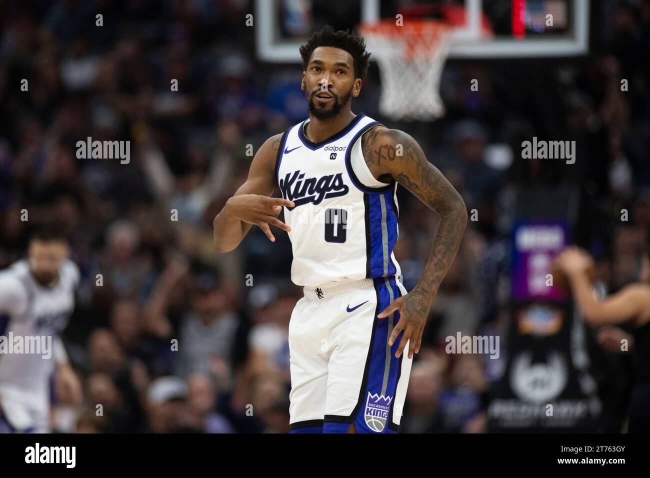 Sacramento Kings guard Malik Monk (0) signals three after scoring a 3 ...