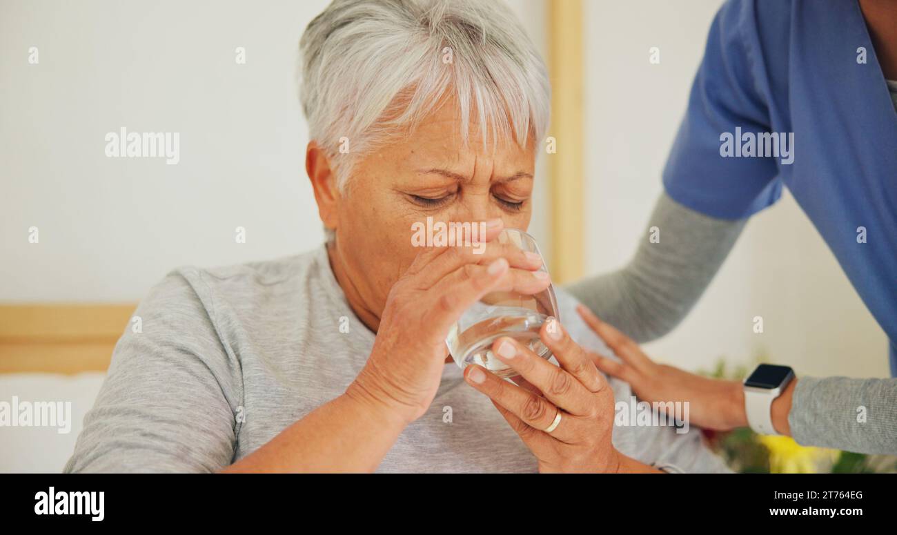 Mature woman drinking mineral water drink hi-res stock photography and ...