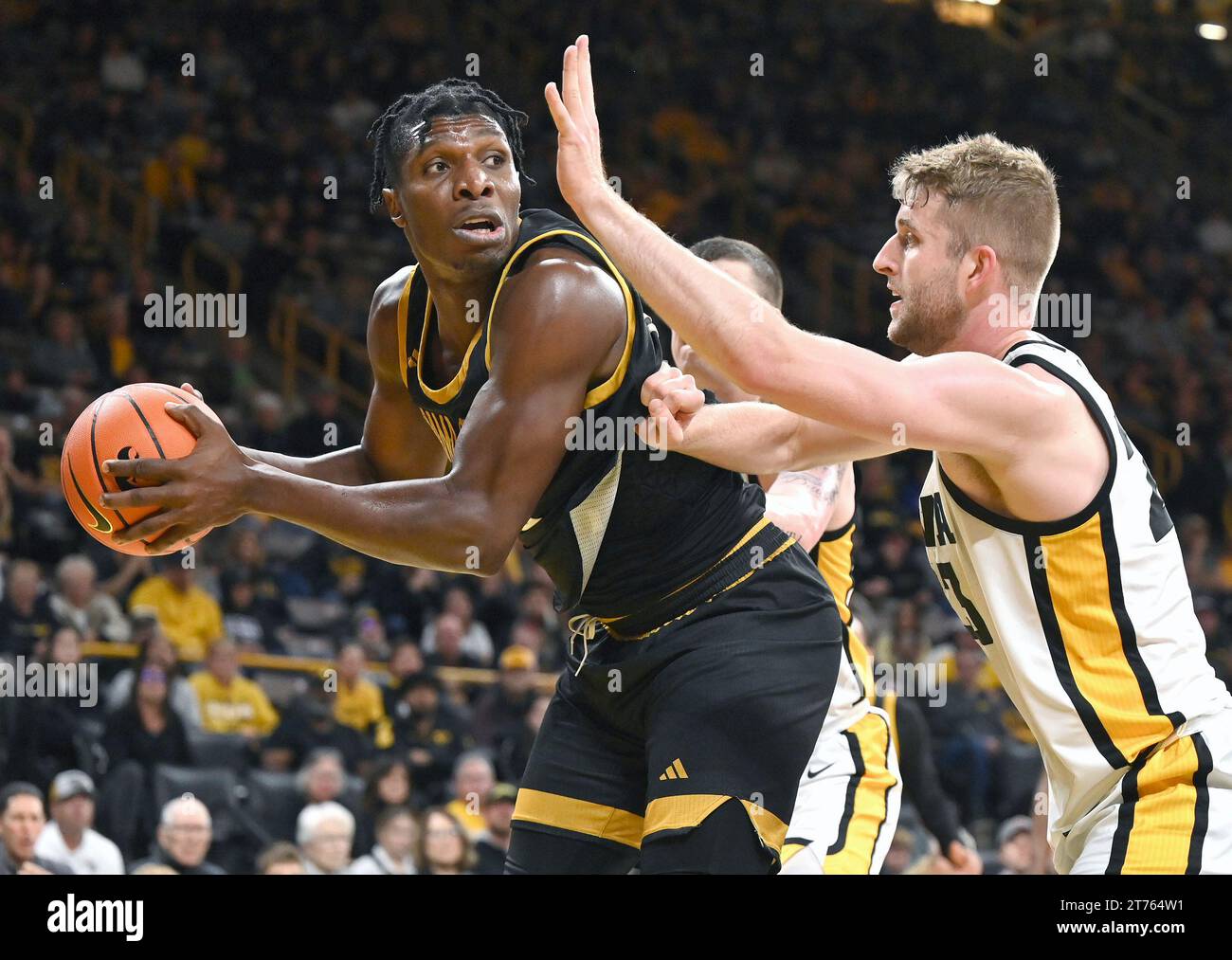 IOWA CITY, IA - NOVEMBER 10: Iowa forward Ben Krikke (23) tightly ...