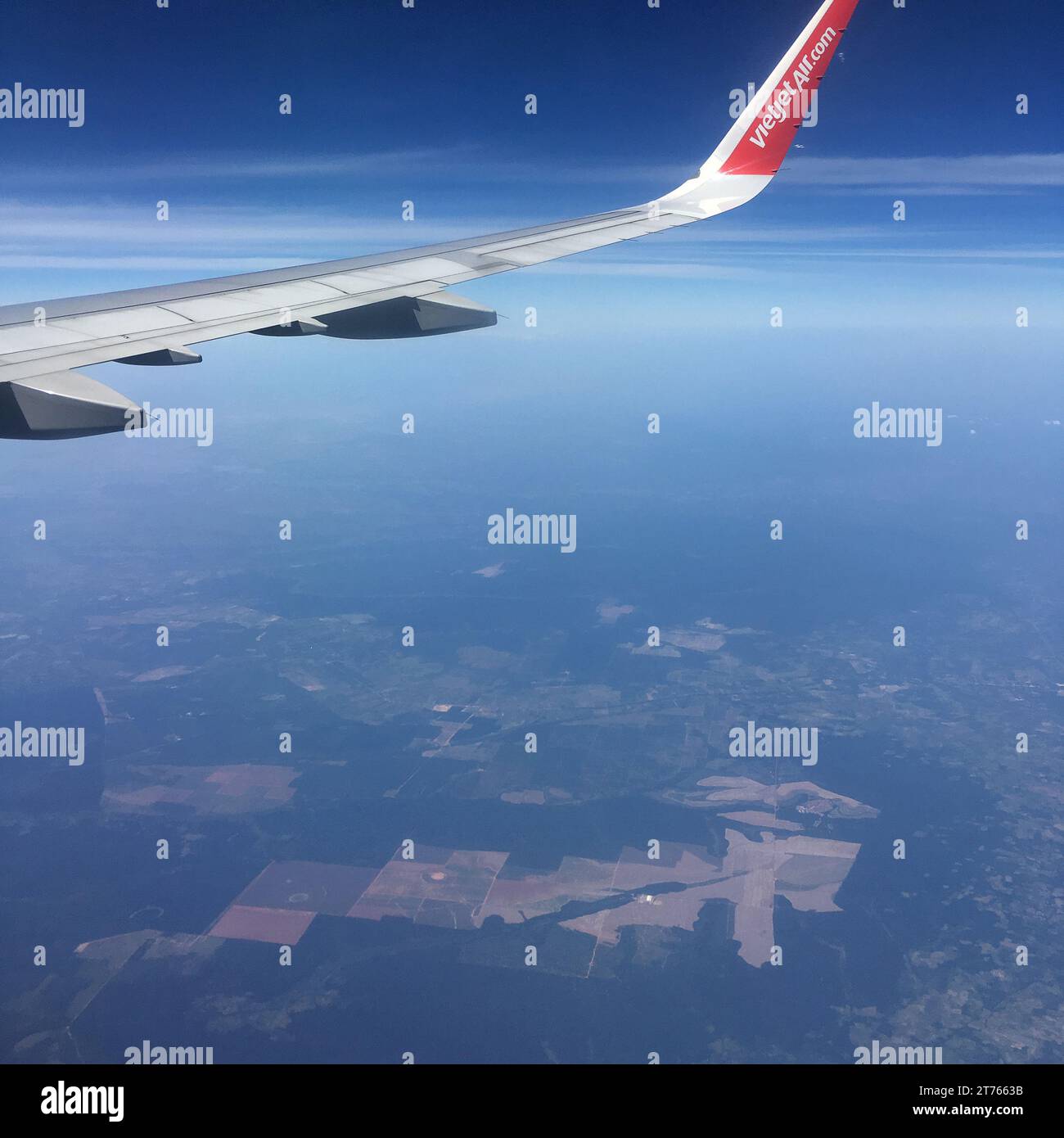 Amazing sky view through the plane window. Vietjet Air Vietnam. View ...