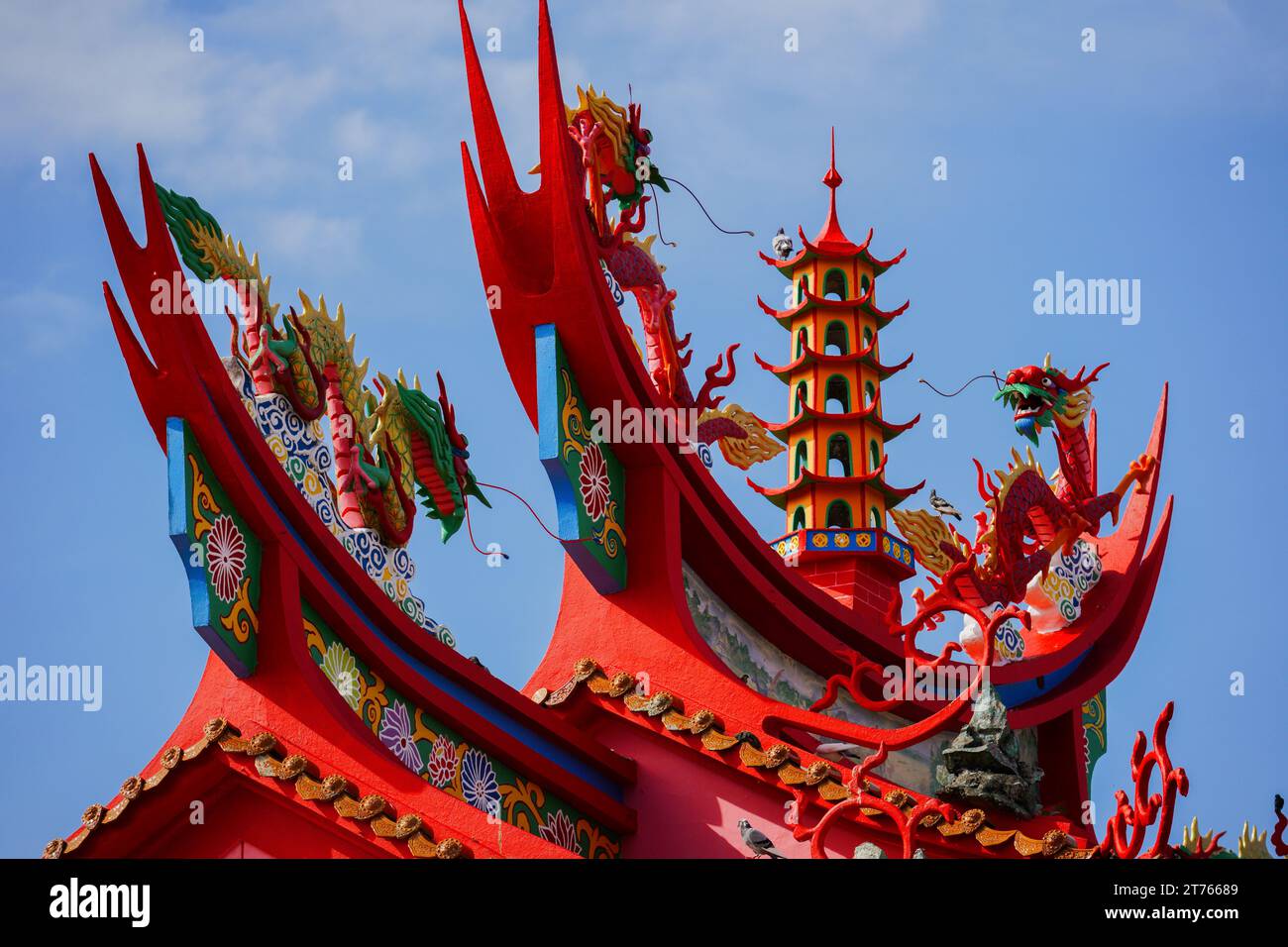 Chinese temple roof with dragons and pagoda. Ling San temple in Tuaran ...