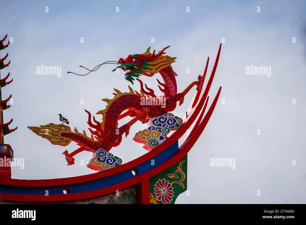 Chinese temple roof with dragon statue decoration. Ling San temple in ...
