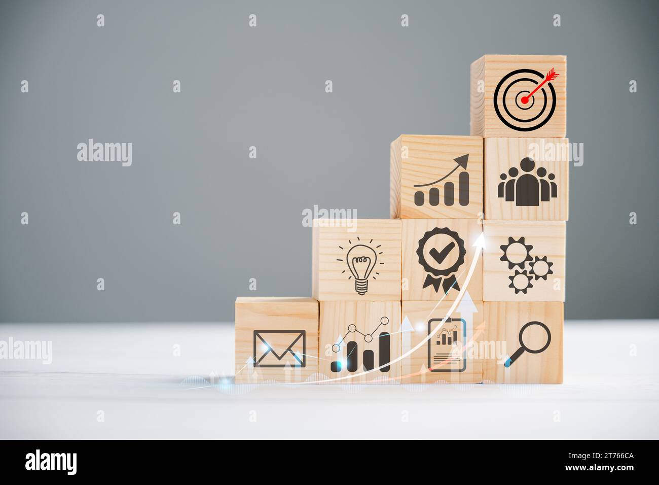 Wooden block cude step on table with Action Plan Stock Photo - Alamy