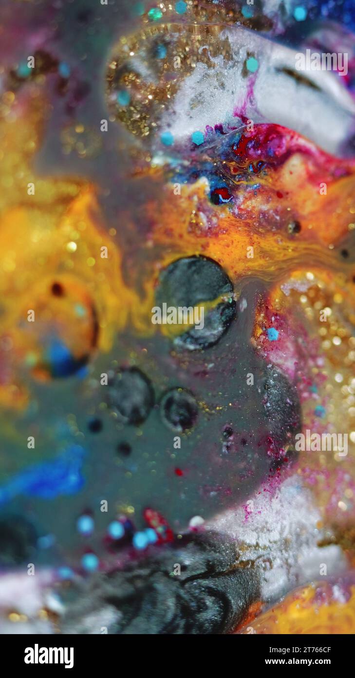 Ink mix background glitter dye bubbles swirls Stock Photo - Alamy