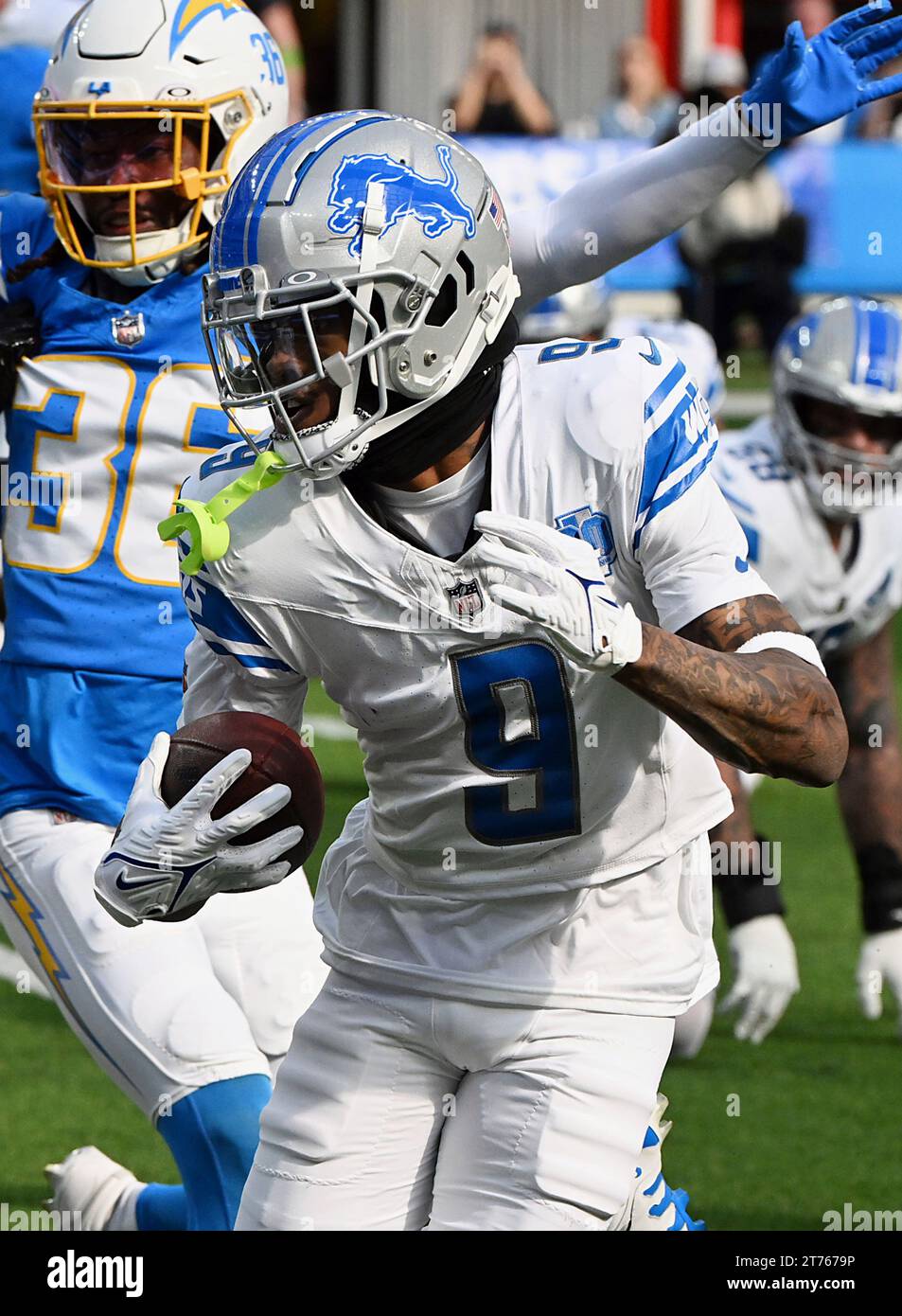 Detroit Lions wide receiver Jameson Williams (9) runs after catching a ...