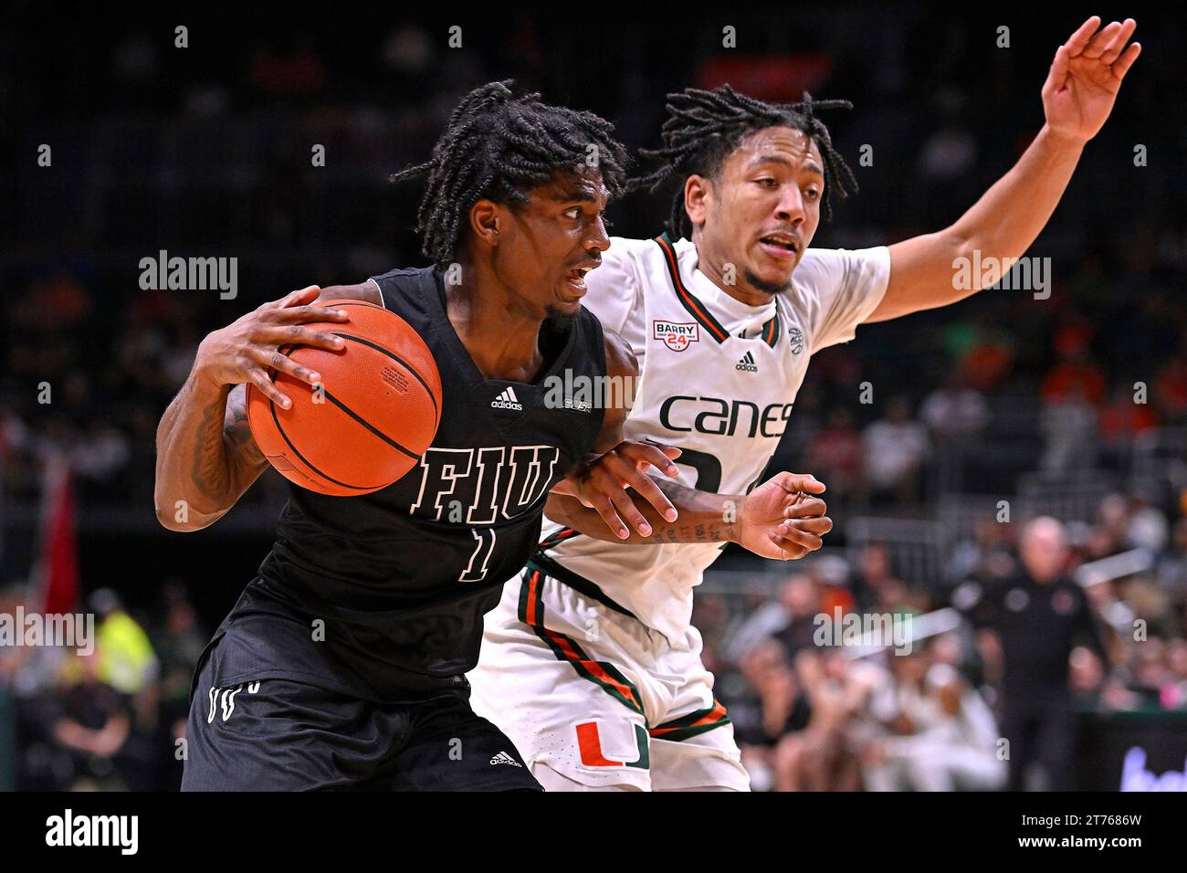 CORAL GABLES, FL - NOVEMBER 13: FIU guard Dashon Gittens (1) drives to ...