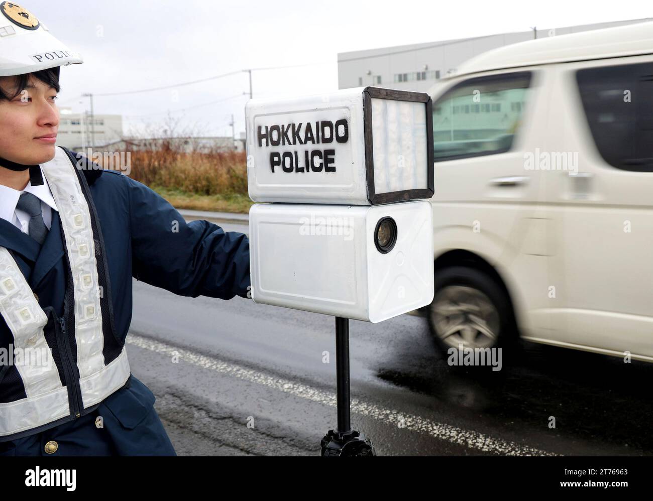Hokkaido Prefectural Police Department sets a dummy device of a traffic ...
