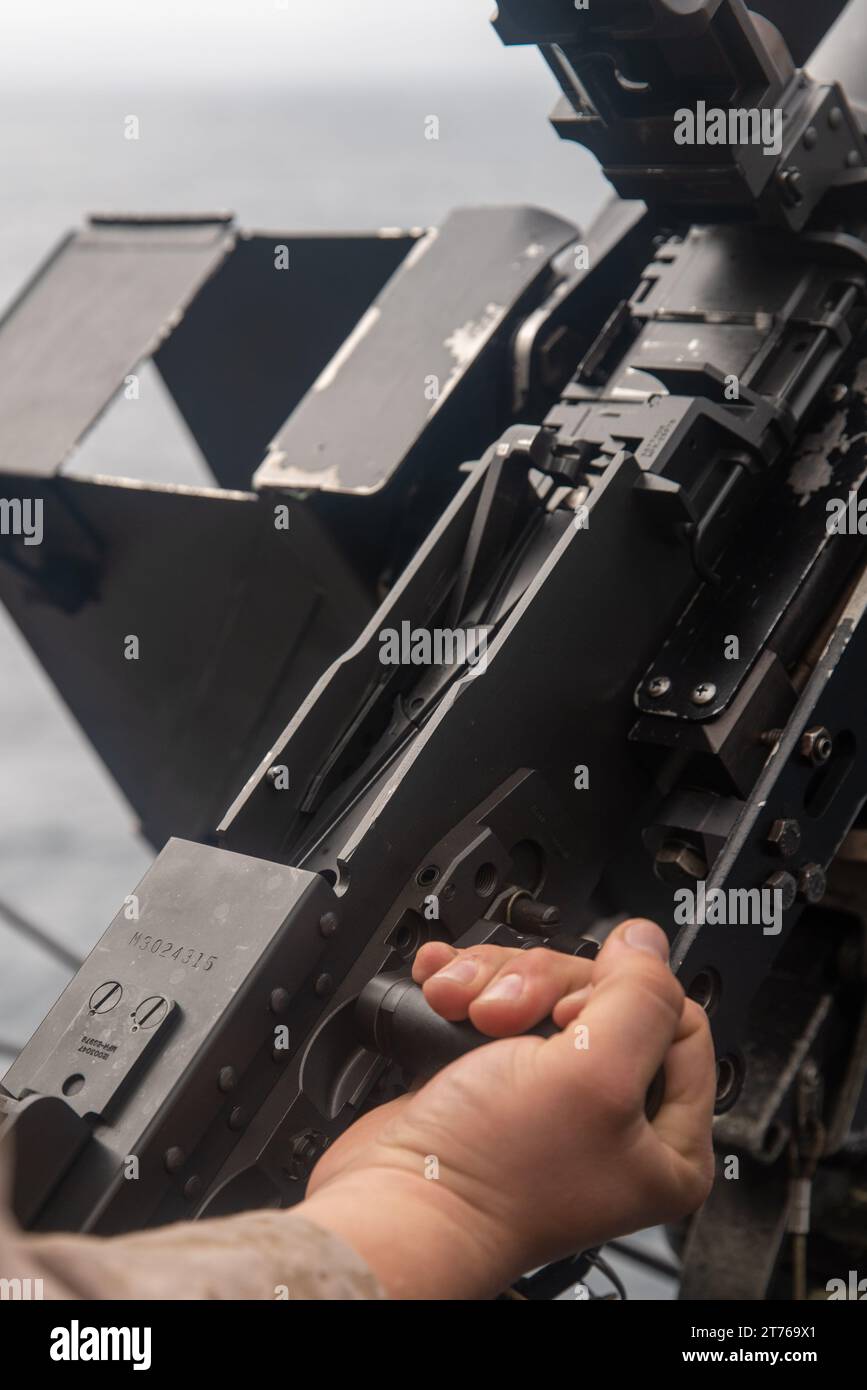 A U.S. Marine assigned to Weapons Company, Battalion Landing Team 1/5 ...