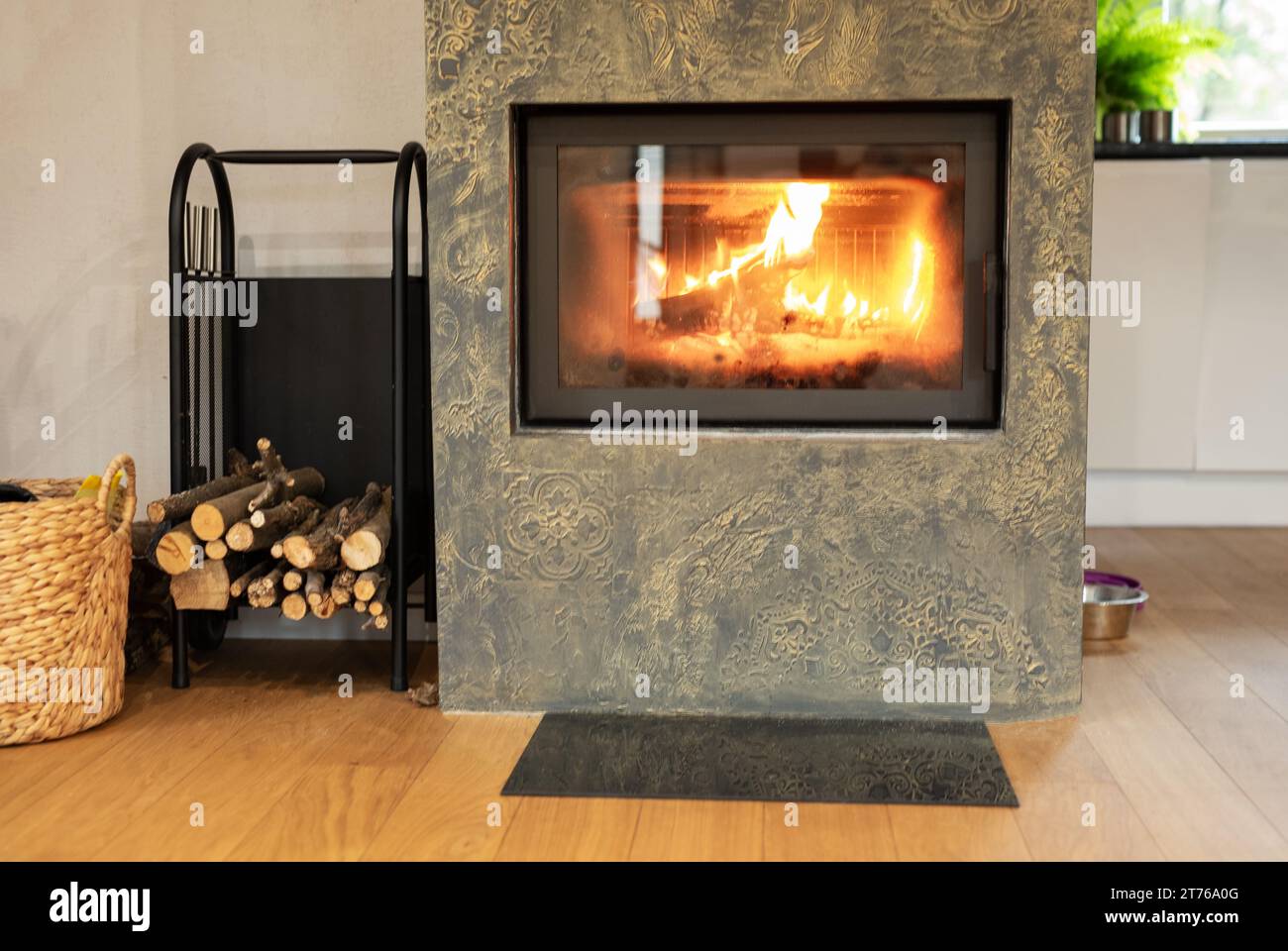 Cosy home interior background with fireplace Stock Photo - Alamy