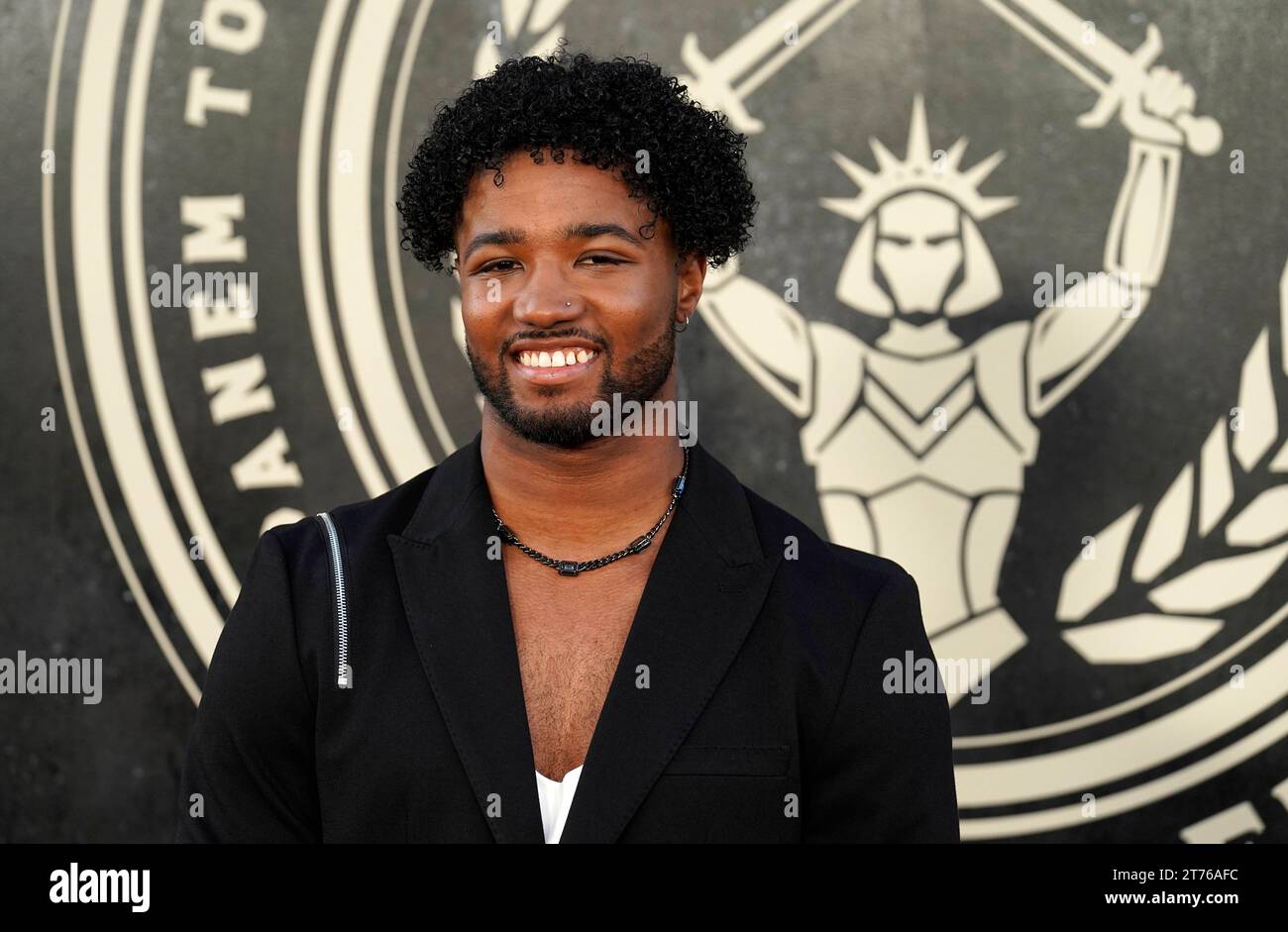 Nick Benson poses at the Los Angeles premiere of the film "The Hunger ...