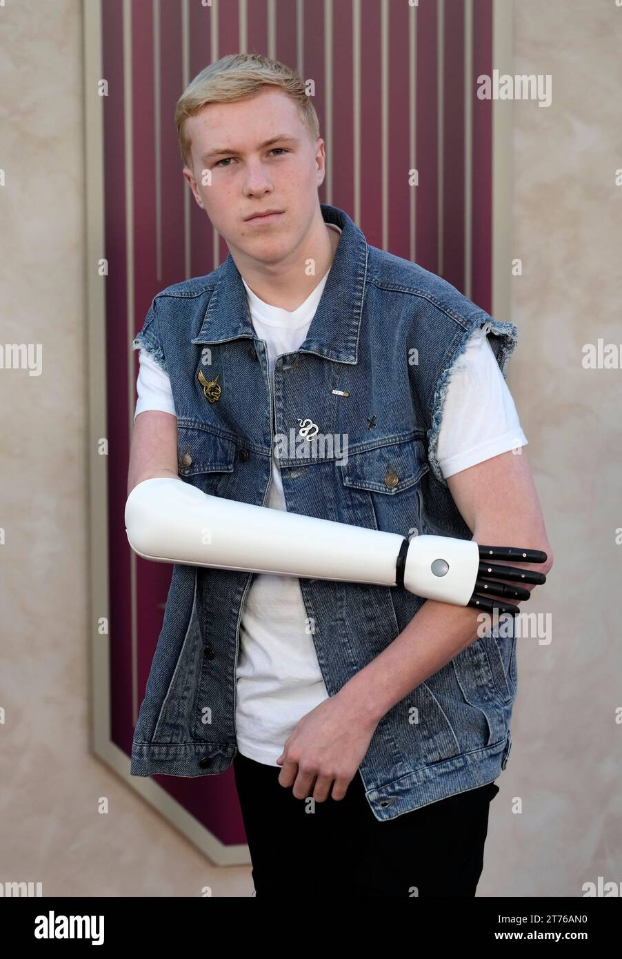 Knox Gibson poses at the Los Angeles premiere of the film "The Hunger Games: The Ballad of ...