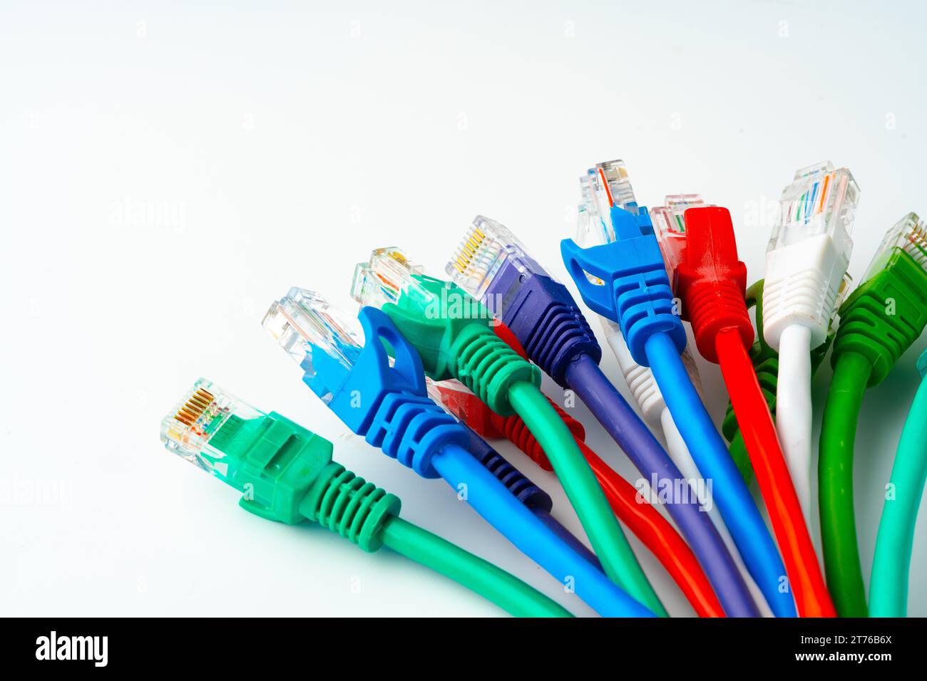 Colorful network cables switch on white background Stock Photo - Alamy