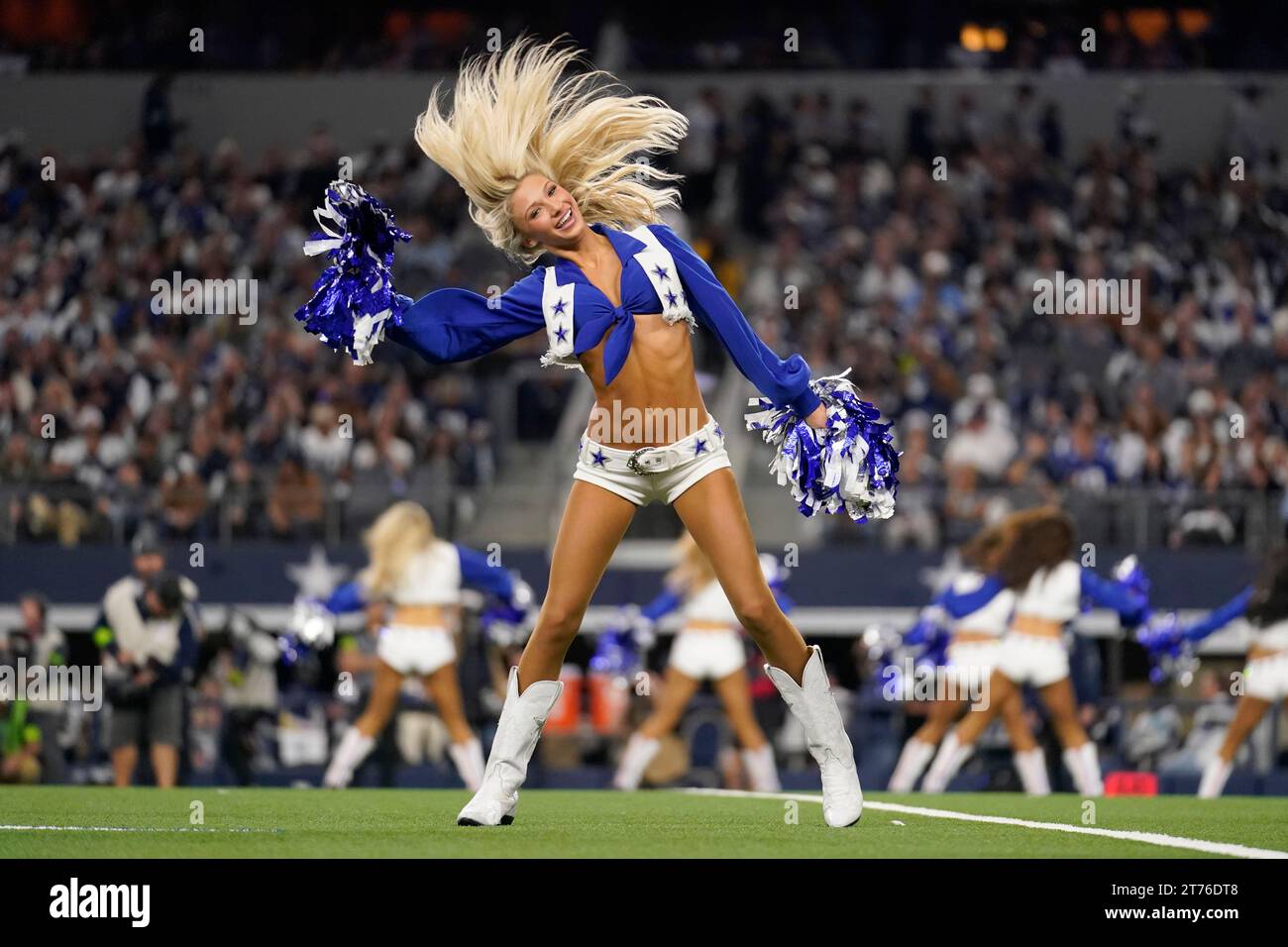 The Dallas Cowboys Cheerleaders perform during an NFL football game ...