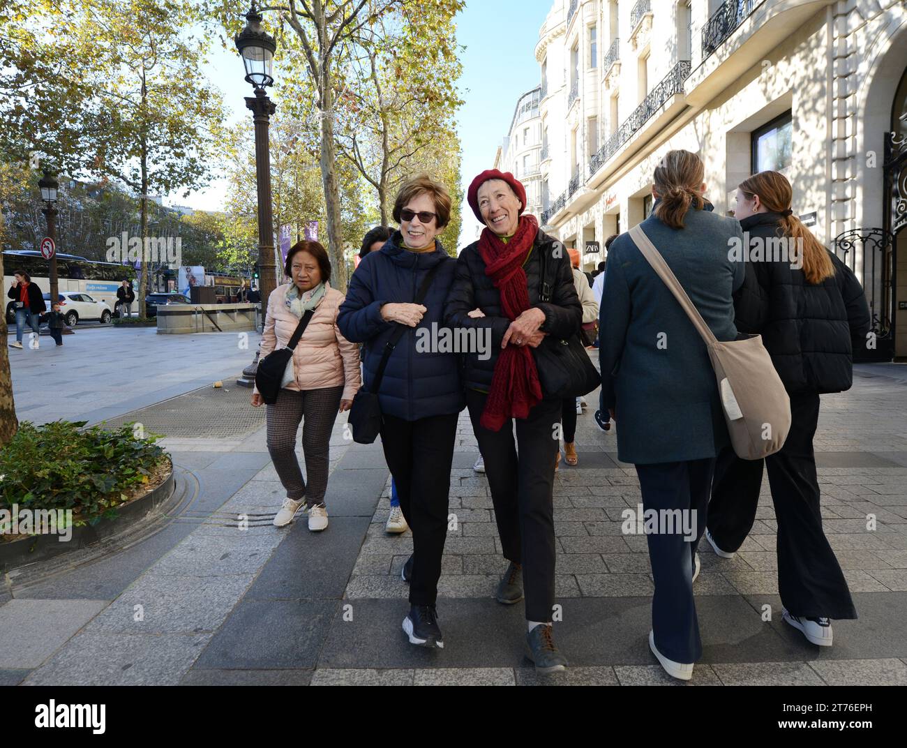 Walking on the iconic Champs-Élysées in the 8th arrondissement of Paris ...