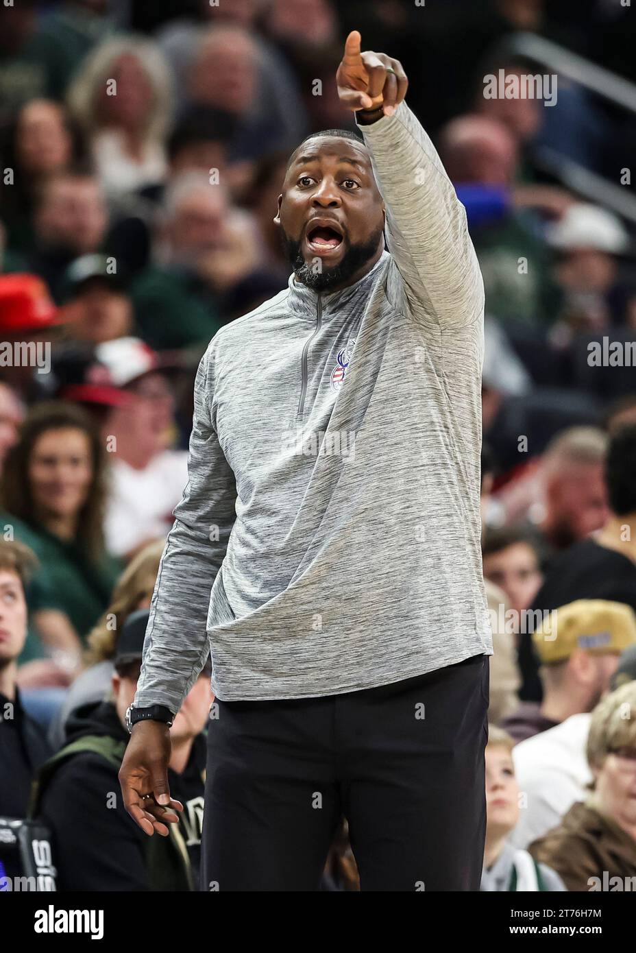 Milwaukee, USA. 13th Nov, 2023. Head coach Adrian Griffith of Milwaukee Bucks gestures during ...